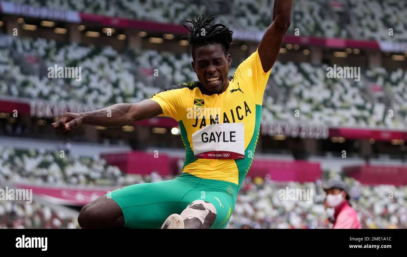 Tajay Gayle, of Jamaica, competes in men's long jump final at the 2020 ...