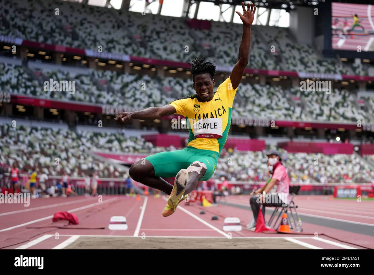 Tajay Gayle, of Jamaica, competes in men's long jump final at the 2020 ...