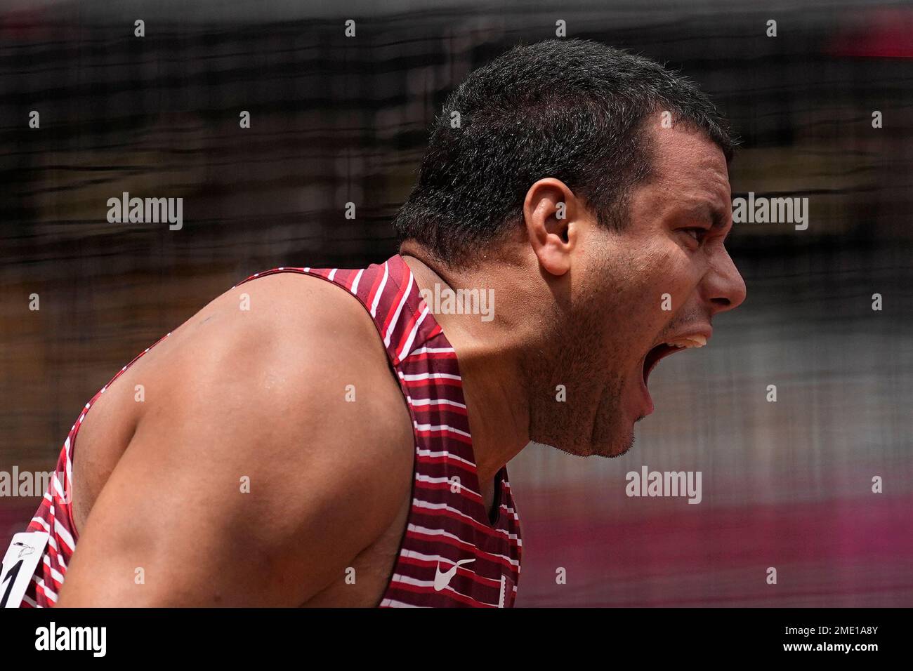 Ashraf El Seify, of Qatar, reacts in qualifications for the men's ...