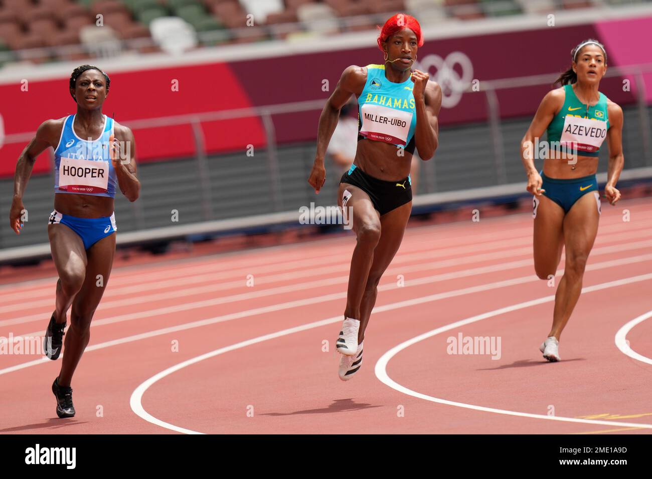 Gloria Hooper, of Italy, Shaunae Miller-Uibo, centre, of Bahamas, and ...