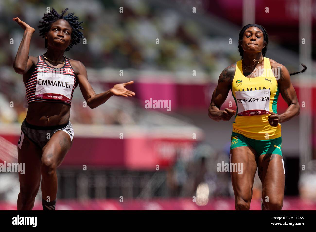 Crystal Emmanuel, left, of Canada, and Elaine Thompson-Herah, of ...