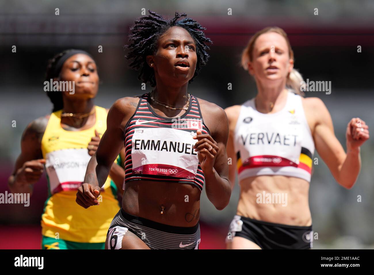 Crystal Emmanuel, of Canada, runs in her heat of the women's 200-meters ...