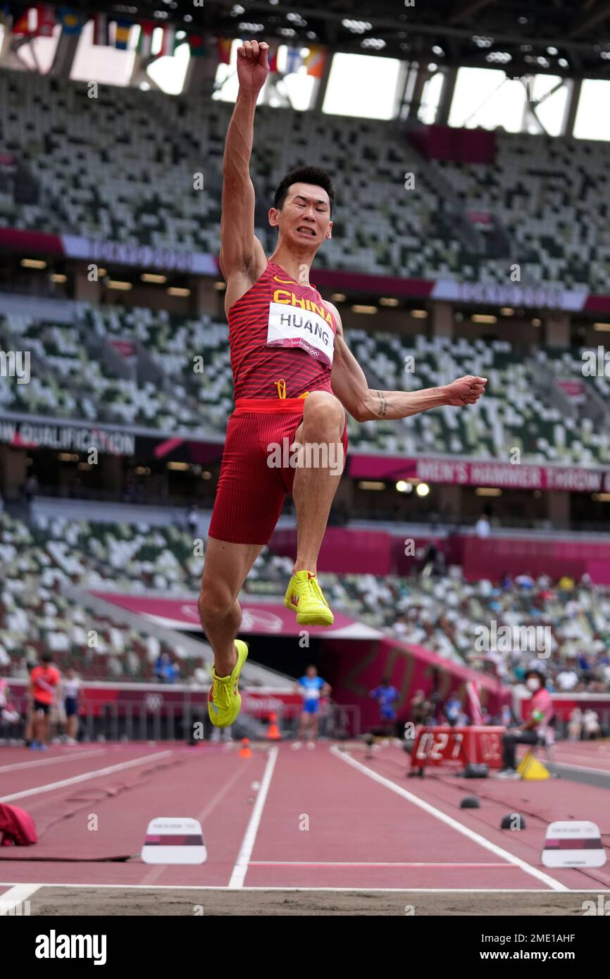 Changzhou Huang, of China, competes in men's long jump final at the ...
