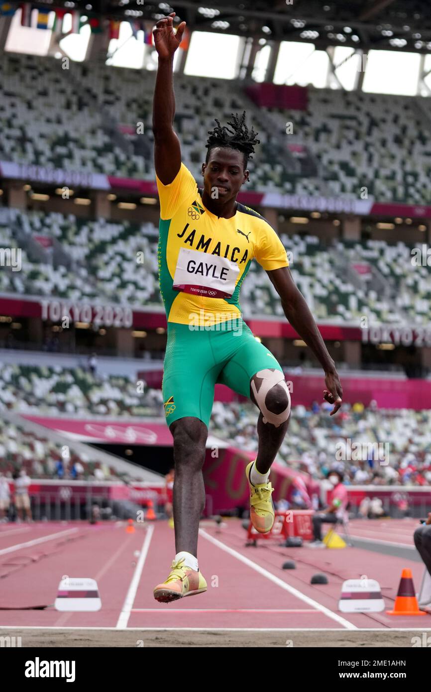 Tajay Gayle, of Jamaica, competes in men's long jump final at the 2020 ...