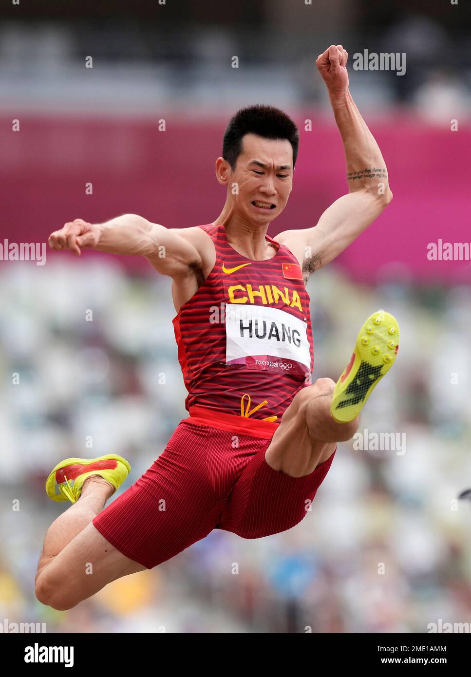 Changzhou Huang, of China competes in the final of the men's long jump ...