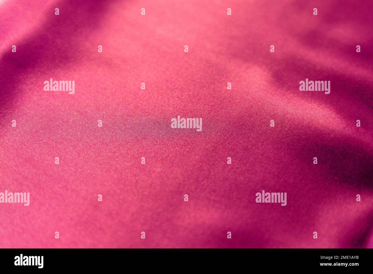 Silk fabric of viva magenta color Stock Photo - Alamy
