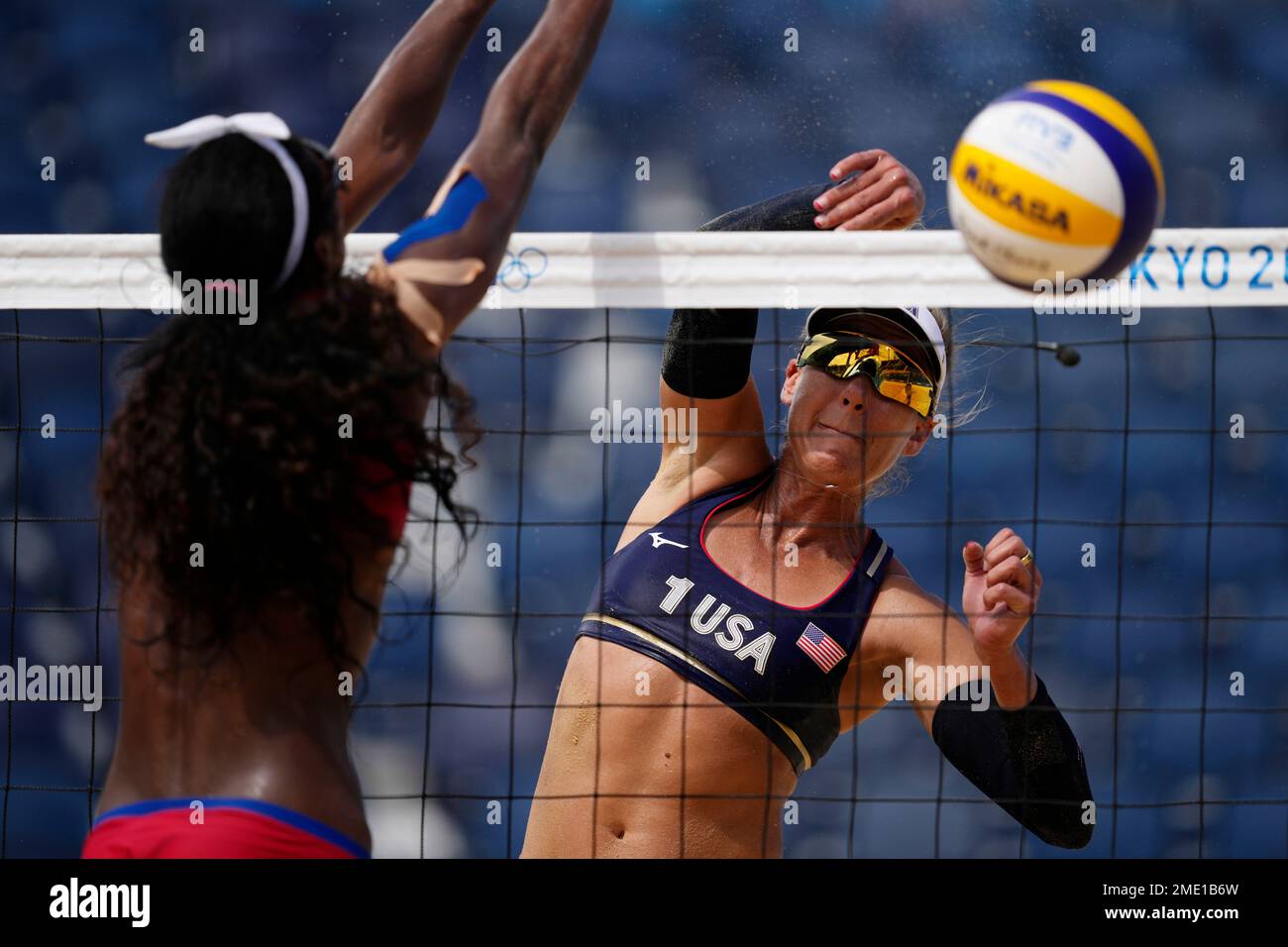 April Ross, right, of the United States, gets a shot past Lidianny ...