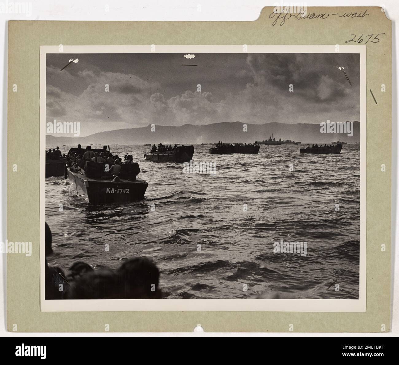 Coast Guard-manned landing barges, carrying U.S. forces, await orders ...