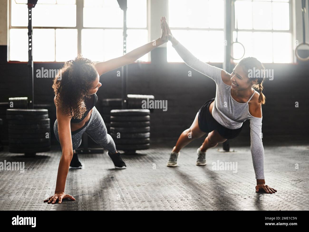 No one motivates you quite like your bestie. two young women giving ...