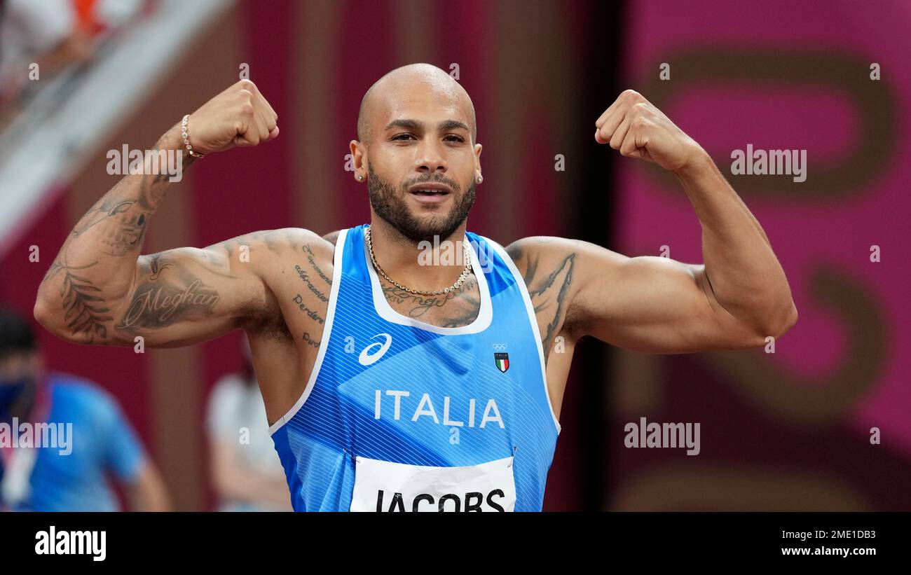 Lamont Marcell Jacobs, of Italy, celebrates after winning the final of ...