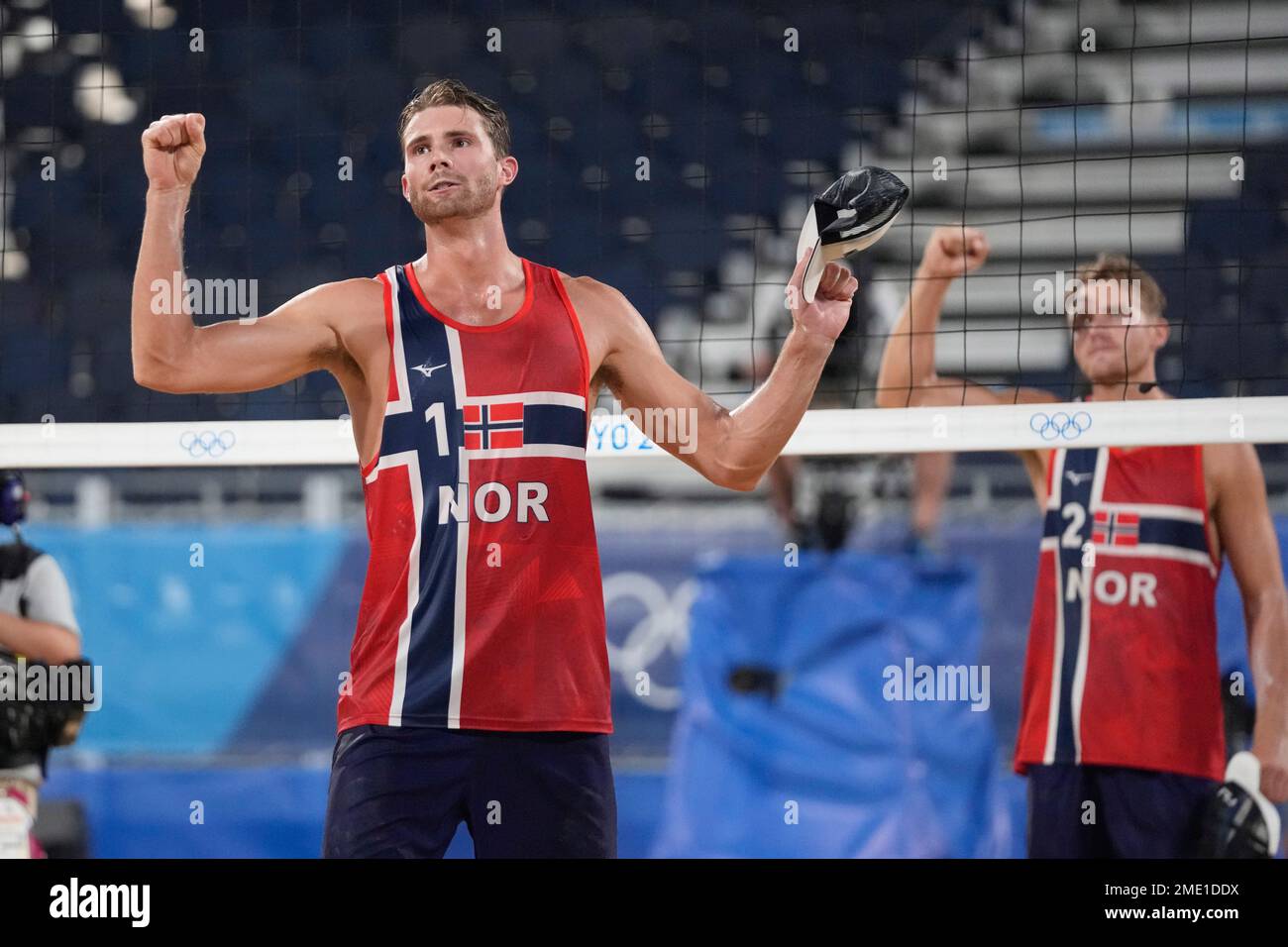 Anders Berntsen Mol, left, of Norway, and teammate Christian Sandlie ...