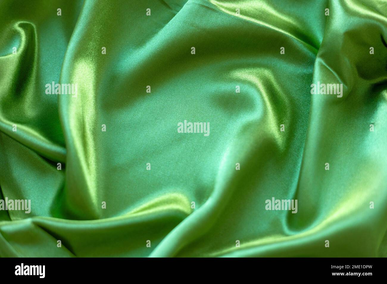 Silk fabric of green color Stock Photo - Alamy