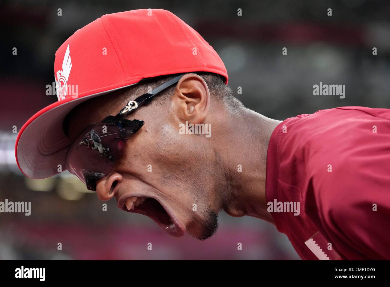 Mutaz Barshim, of Qatar, celebrates after winning the final of the men ...