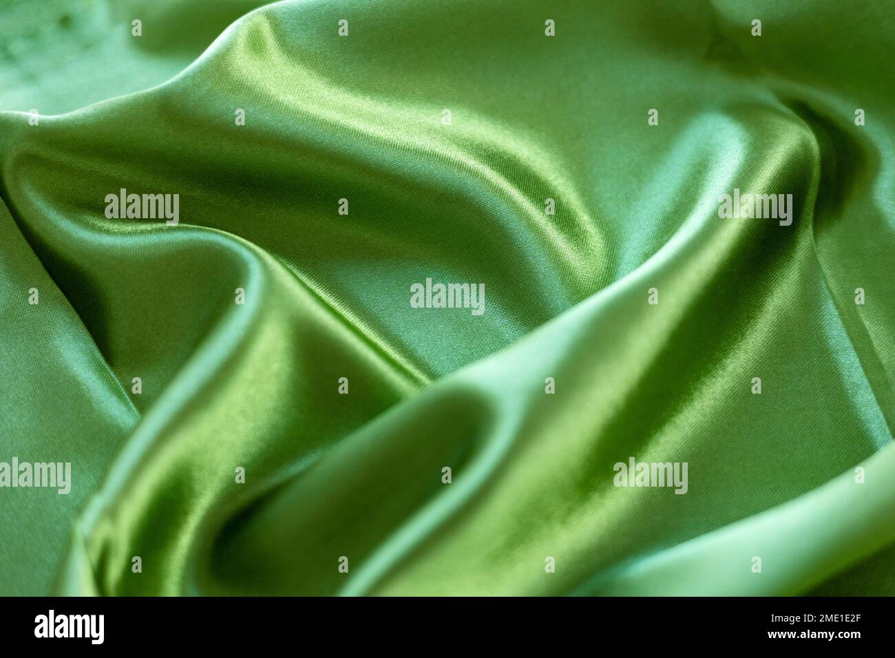 Silk fabric of green color Stock Photo - Alamy