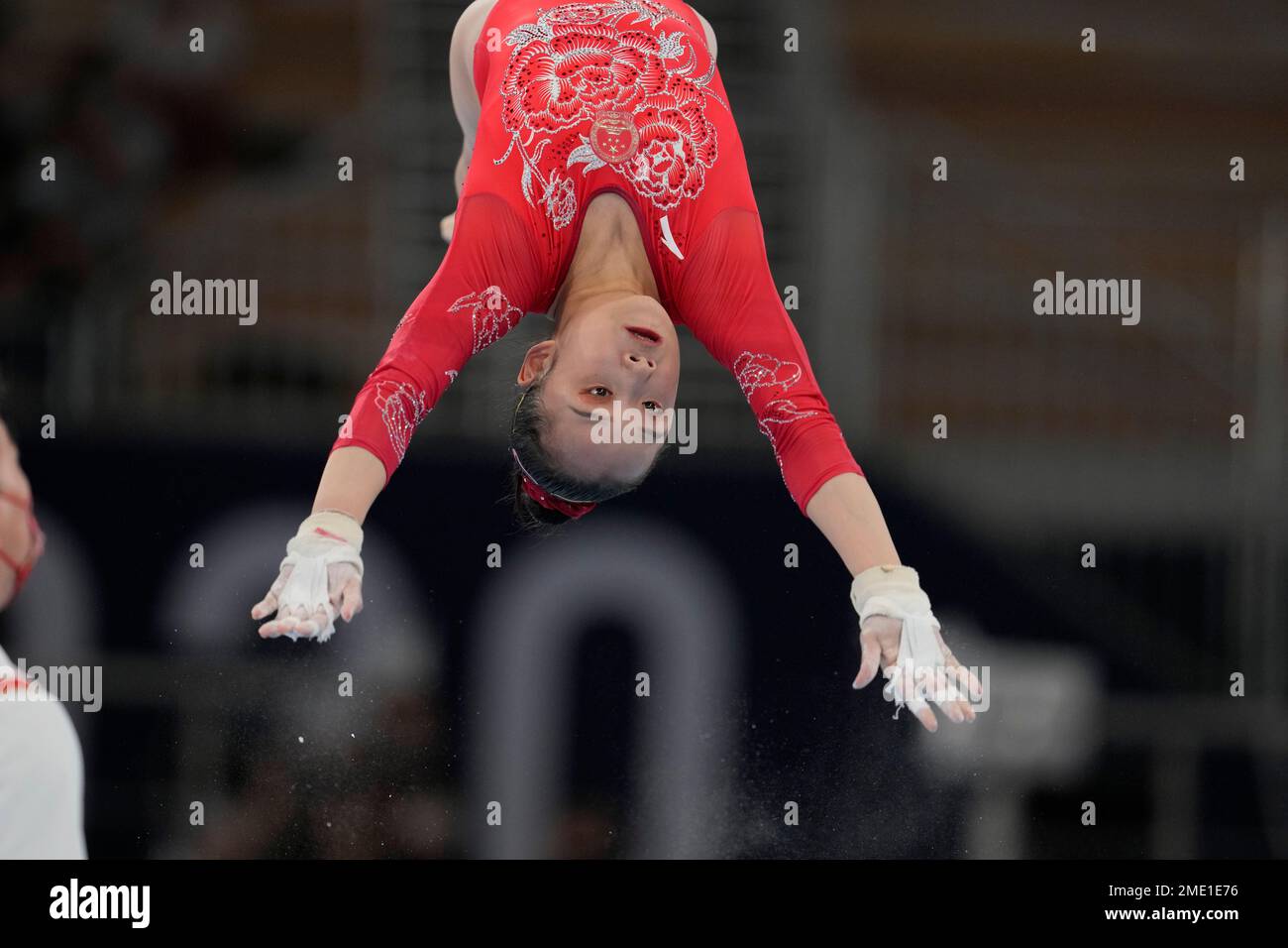 Fan Yilin, of China, performs on the uneven bars during the artistic ...
