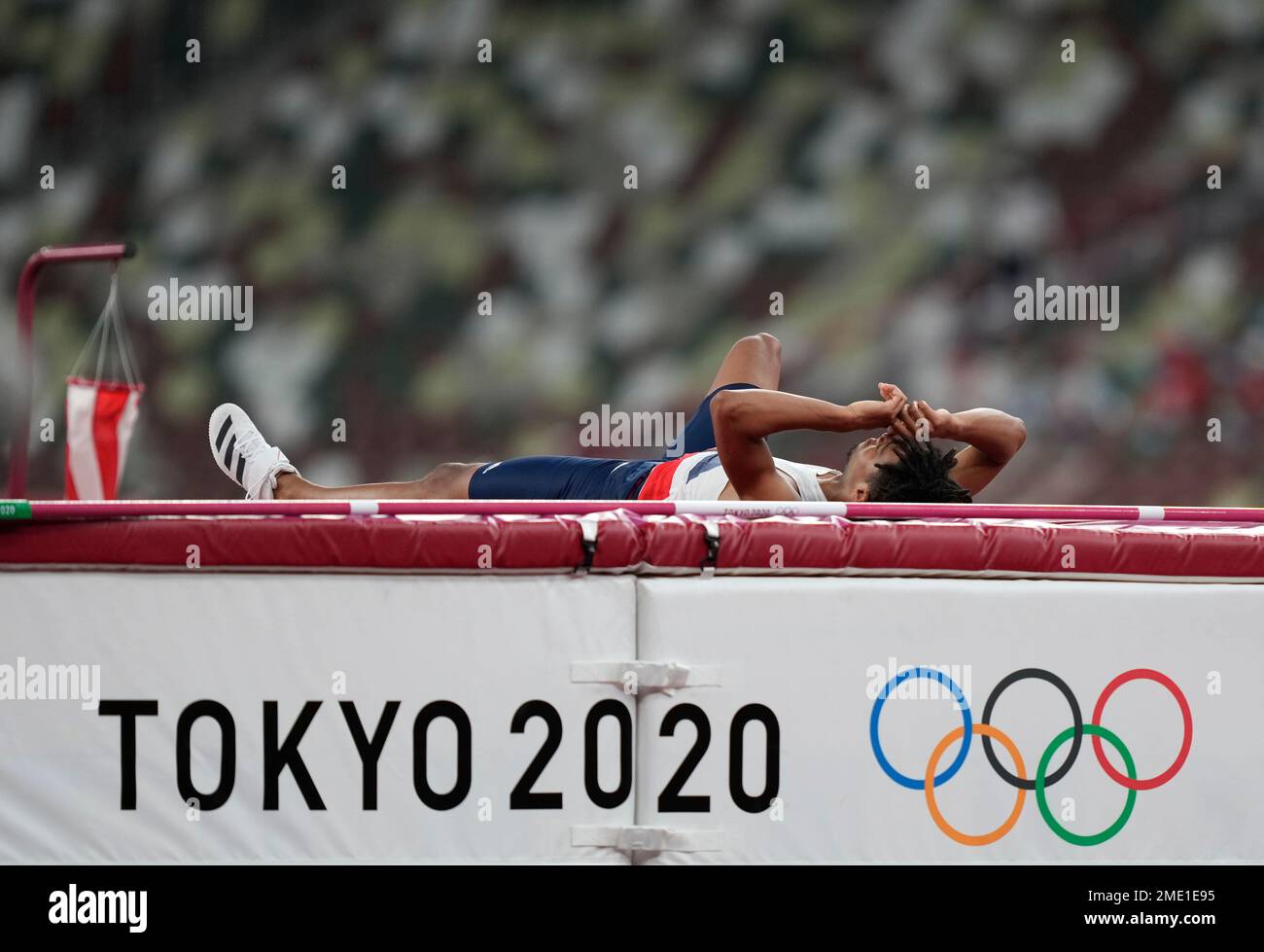 Tom Gale, of Britain reacts after failing with an attempted clearance ...