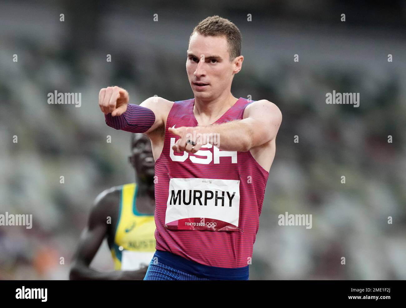 Clayton Murphy, of United States, reacts after finishing a semifinal of ...