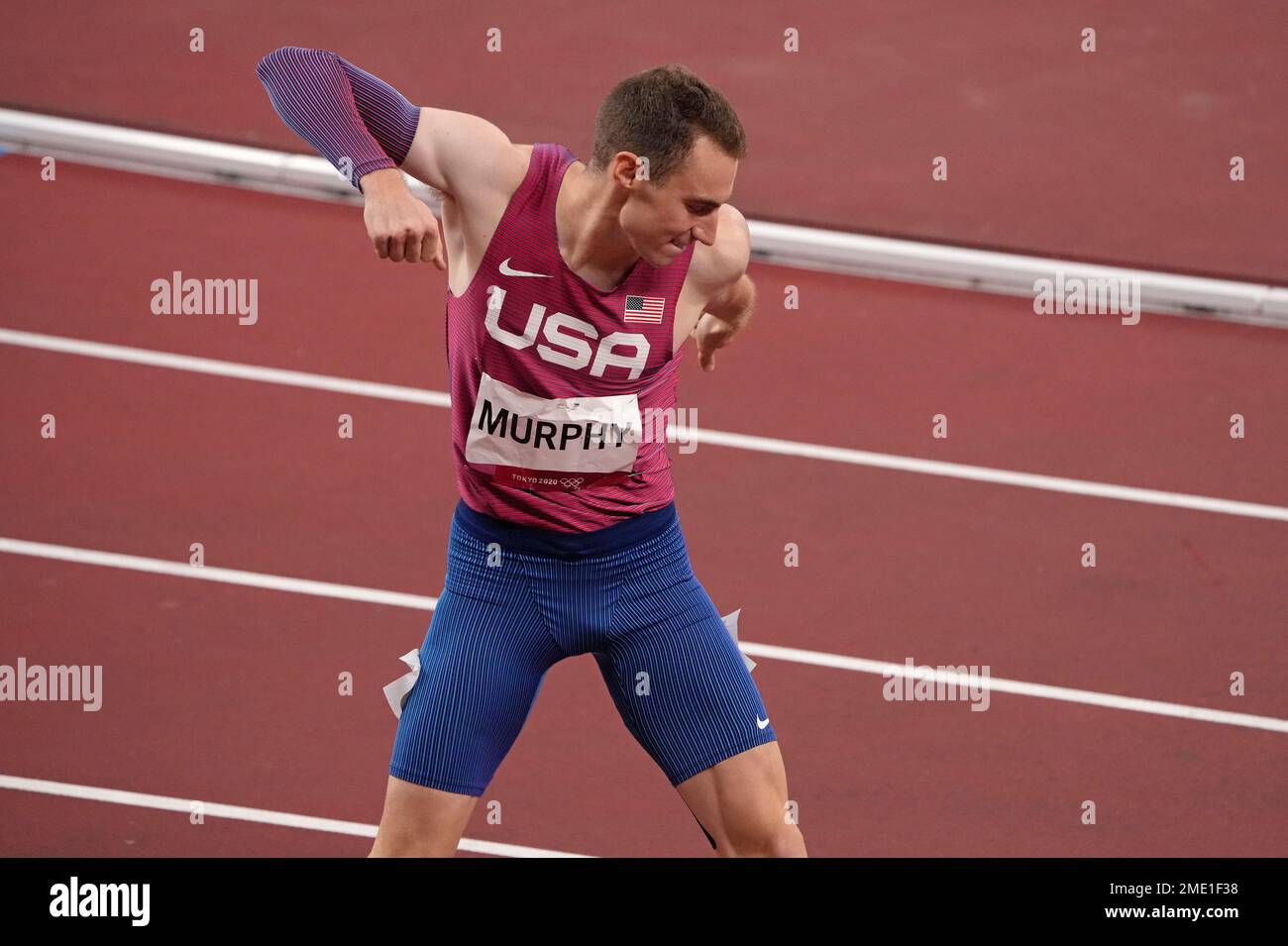 Clayton Murphy, of United States, reacts after finishing a semifinal of ...