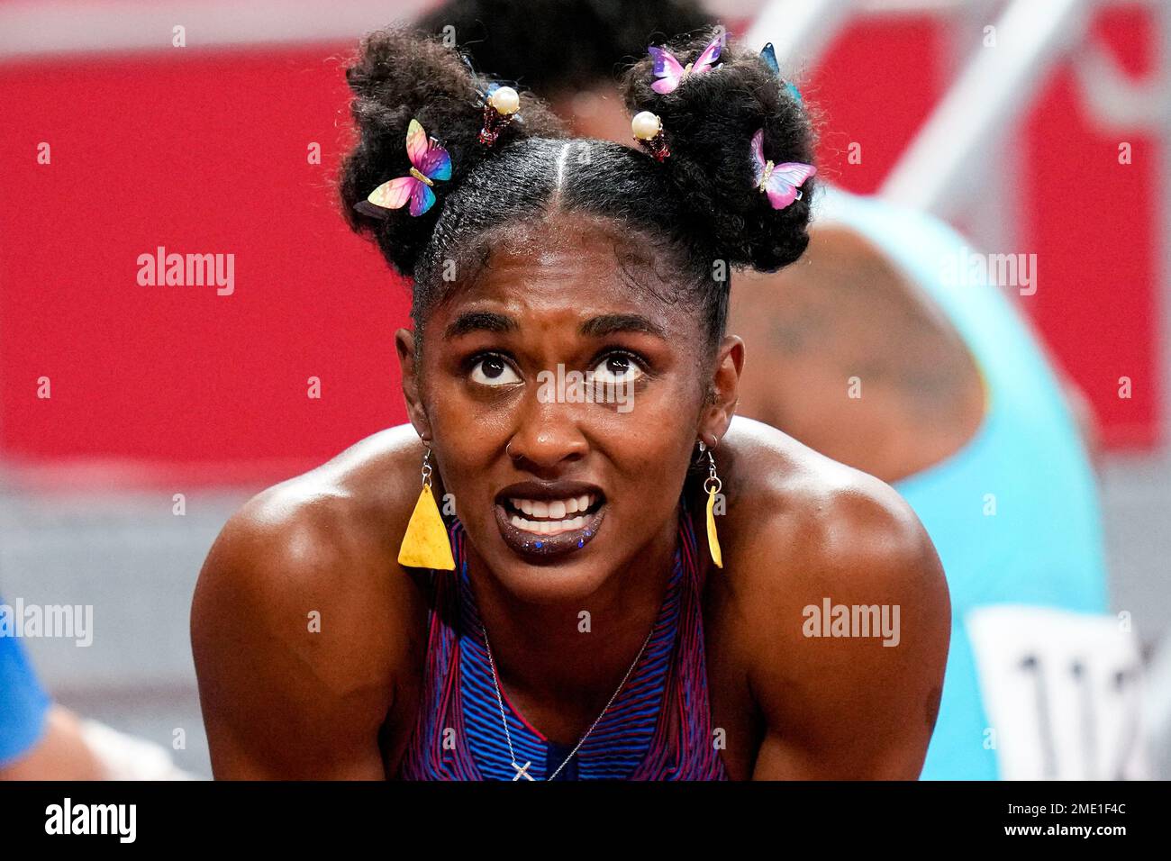 Christina Clemons, of the United States, reacts after a women's 100 ...