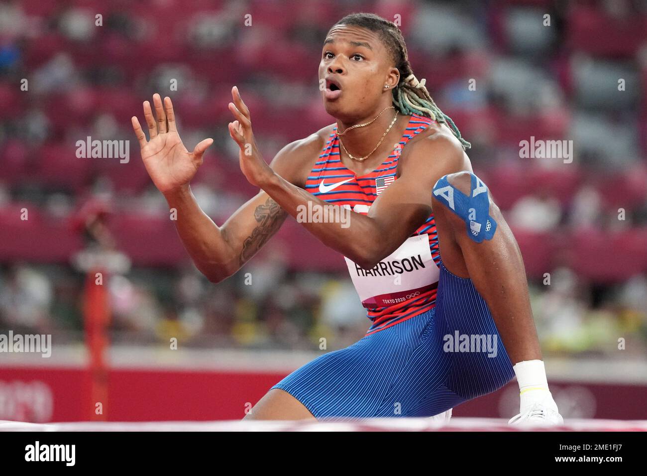 Juvaughn Harrison, of the United States, reacts in the final of the men ...