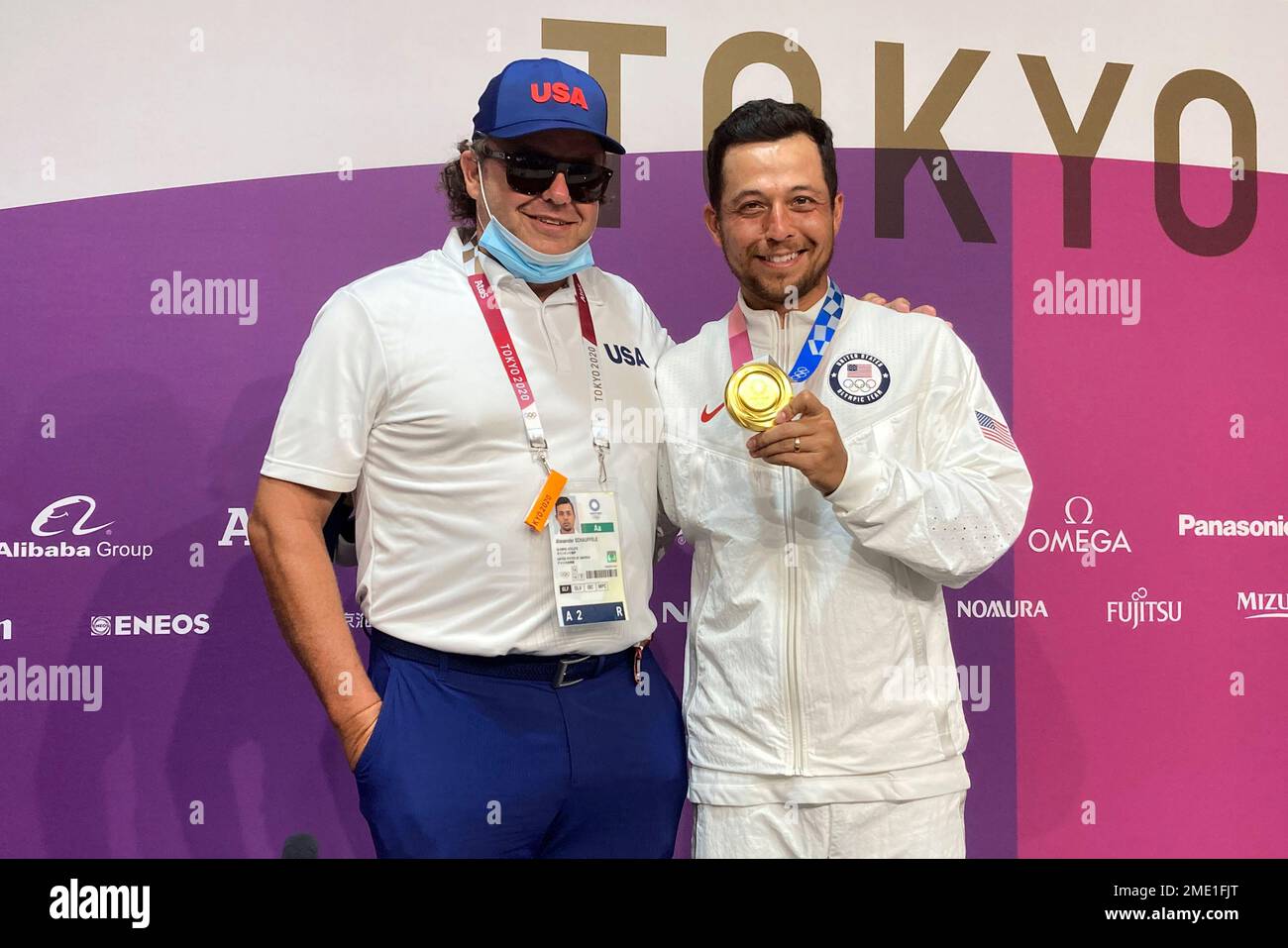 Xander Schauffele, of the United States, poses with his gold medal in ...
