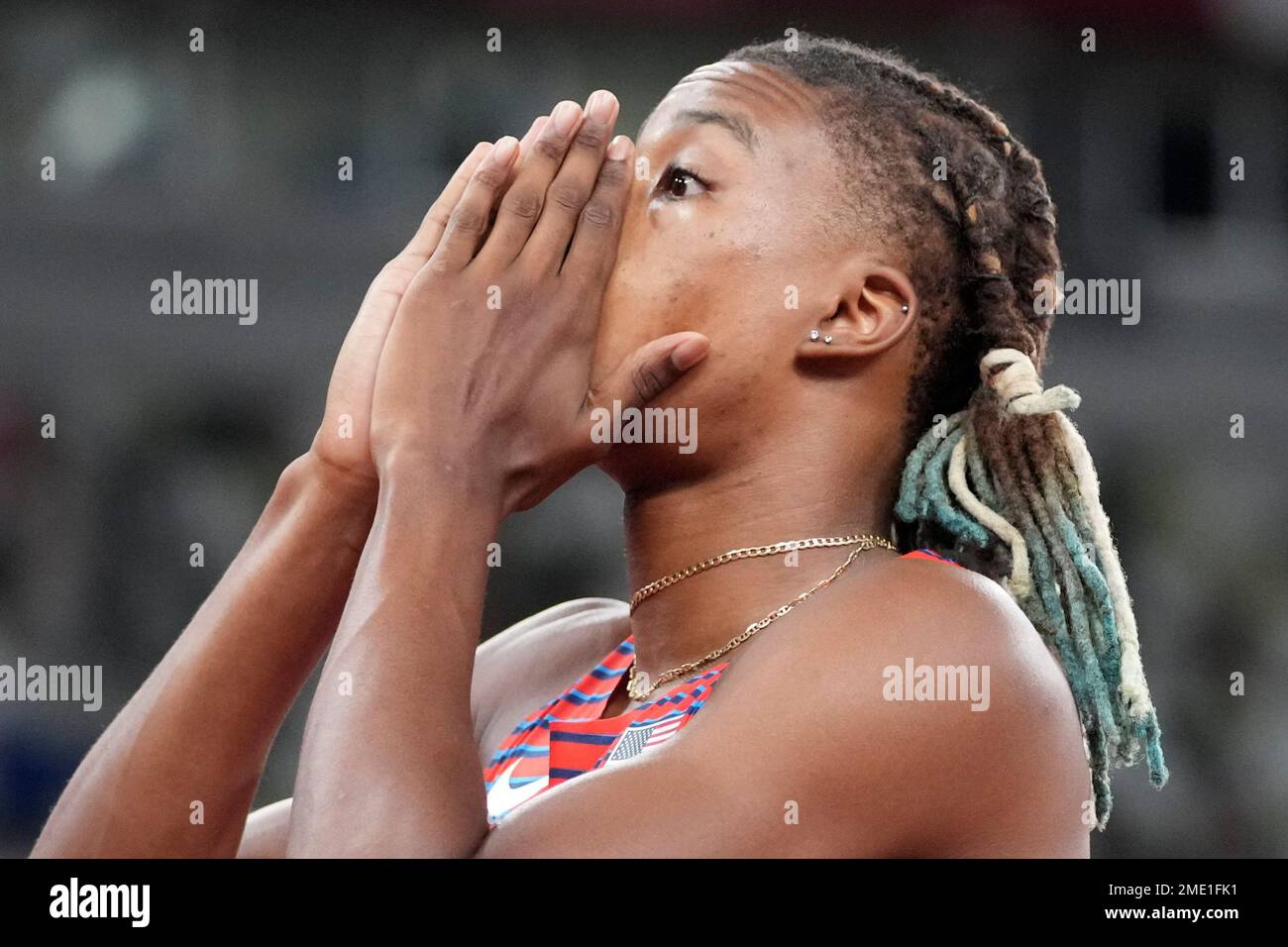 Juvaughn Harrison, of the United States, reacts in the final of the men ...