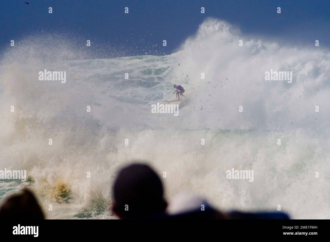 January 22, 2023, Haleiwa, Hawaii, USA: A competetor rides an enourmous ...