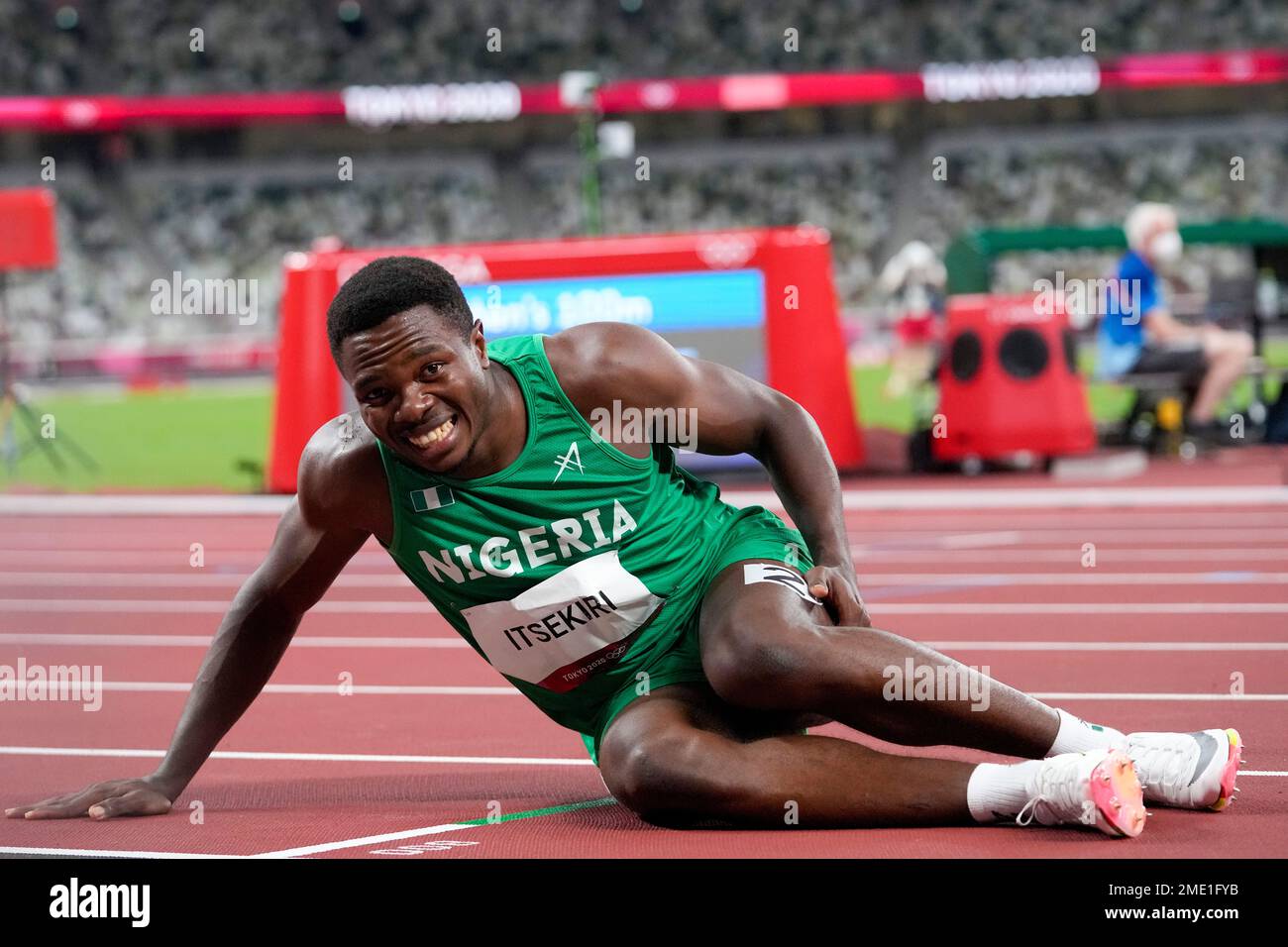 Enoch Adegoke, of Nigeria, reacts after a men's 100-meter semifinal at ...