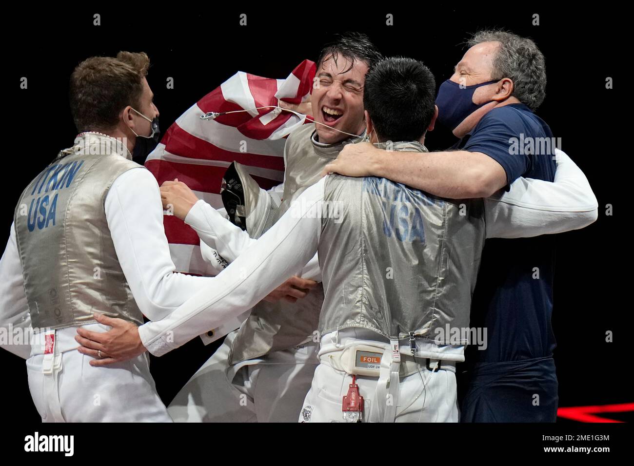 Unites States Foil team celebrate defeating Japan Foil team during the ...