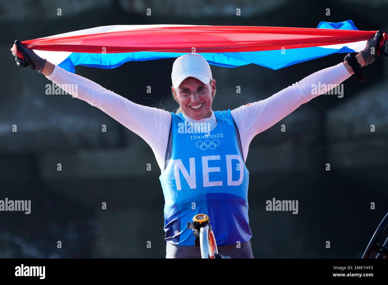 Marit Bouwmeester, of the Netherlands, celebrates after placing third ...