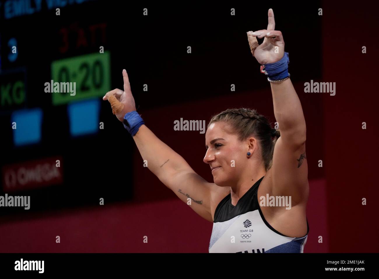 Emily Victoria Godley of Britain reacts after a lift, in the women's ...