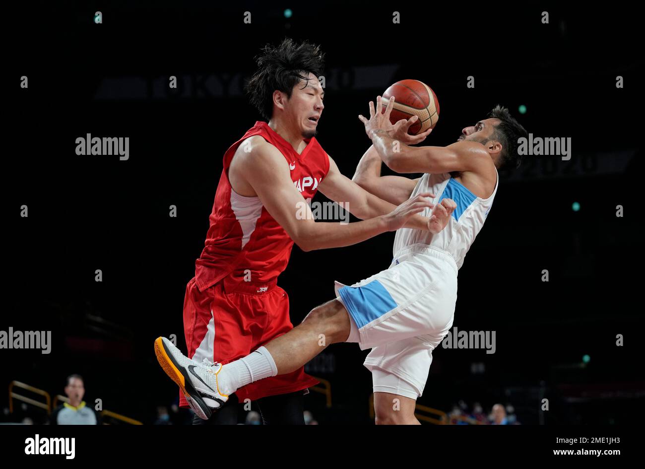Argentina's Facundo Campazzo (7), right, shoots against Japan's Makoto ...
