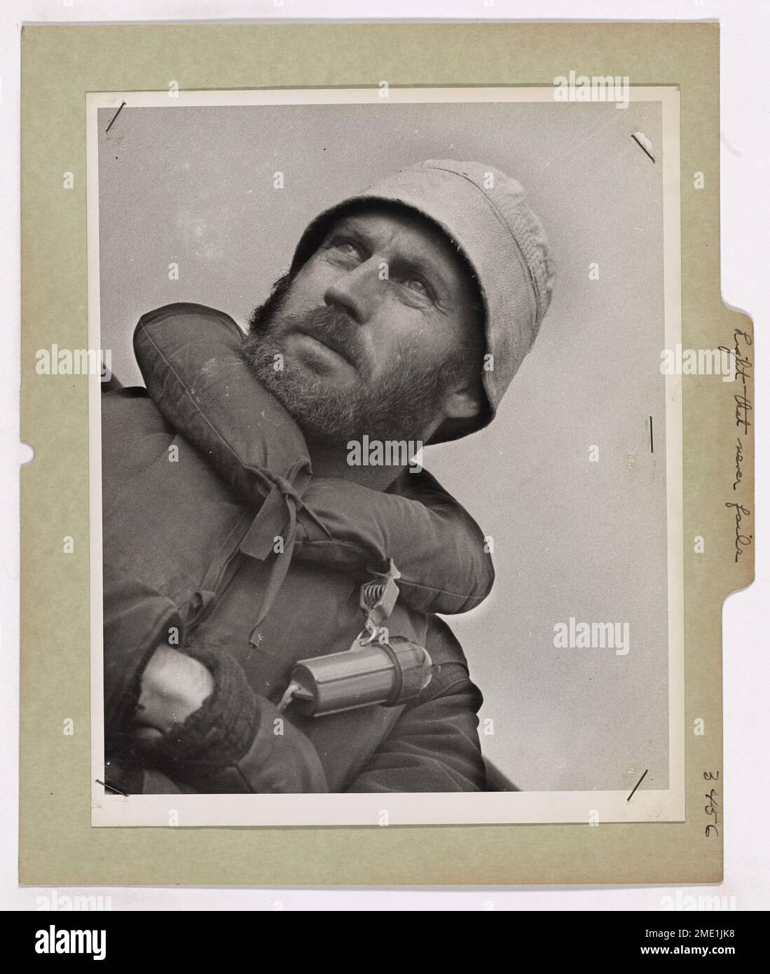 Photograph of Coast Guardsman Wearing a Life Preserver. The Light That ...