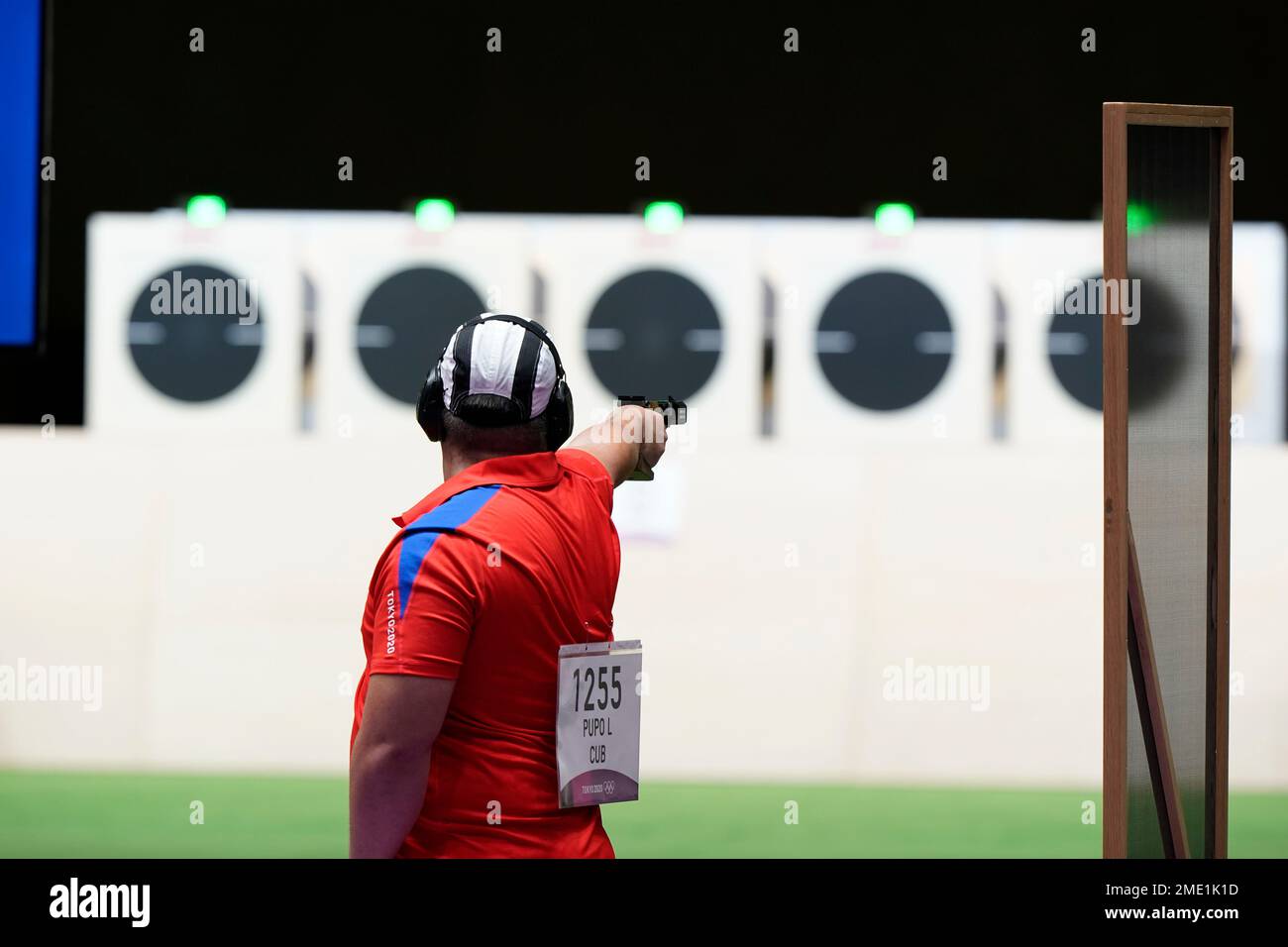 competes in the men's 25-meter rapid fire pistol at the Asaka Shooting ...