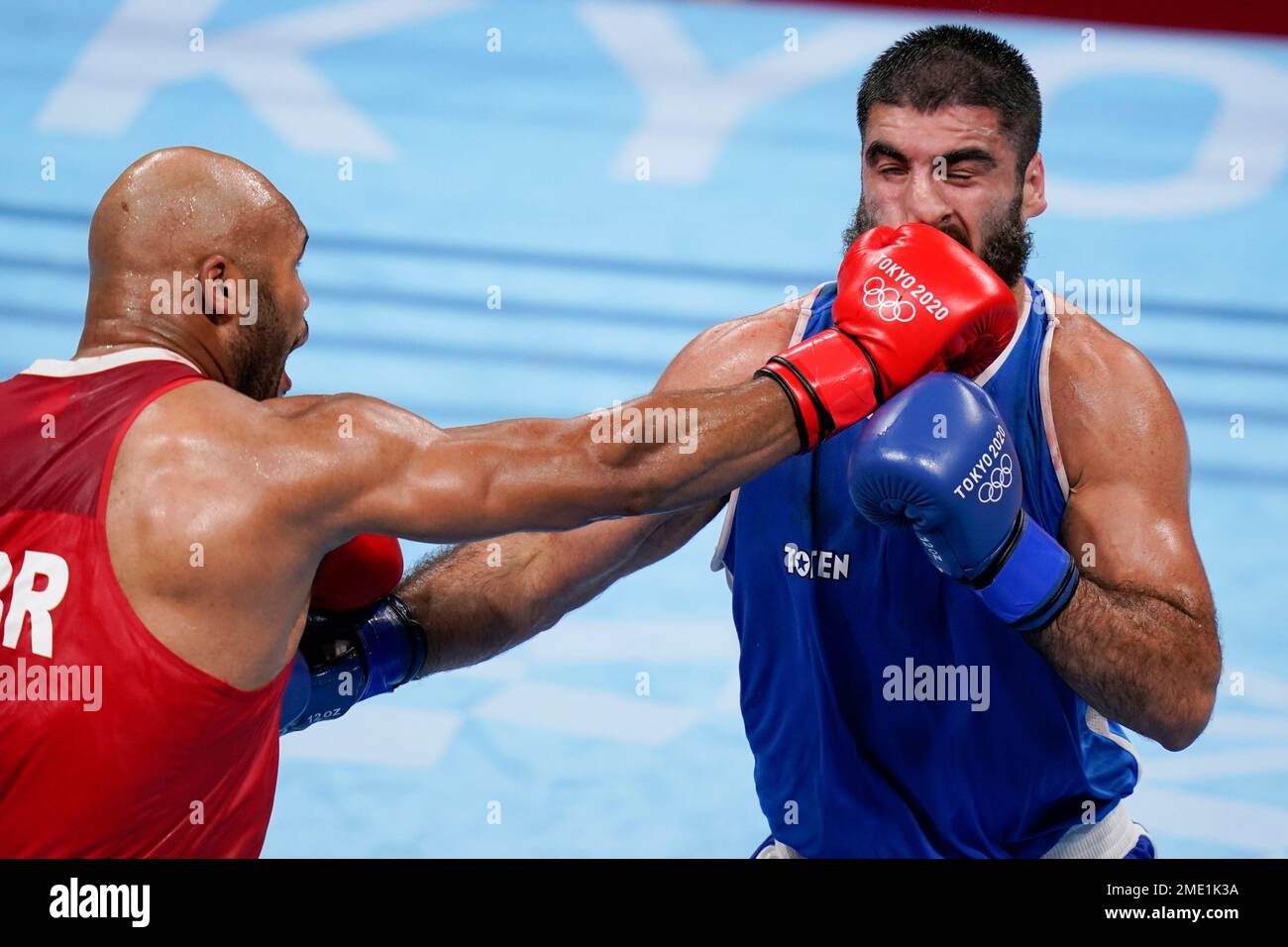 Britain's Frazer Clarke, left, punches Eliad Mourad, of France during a ...
