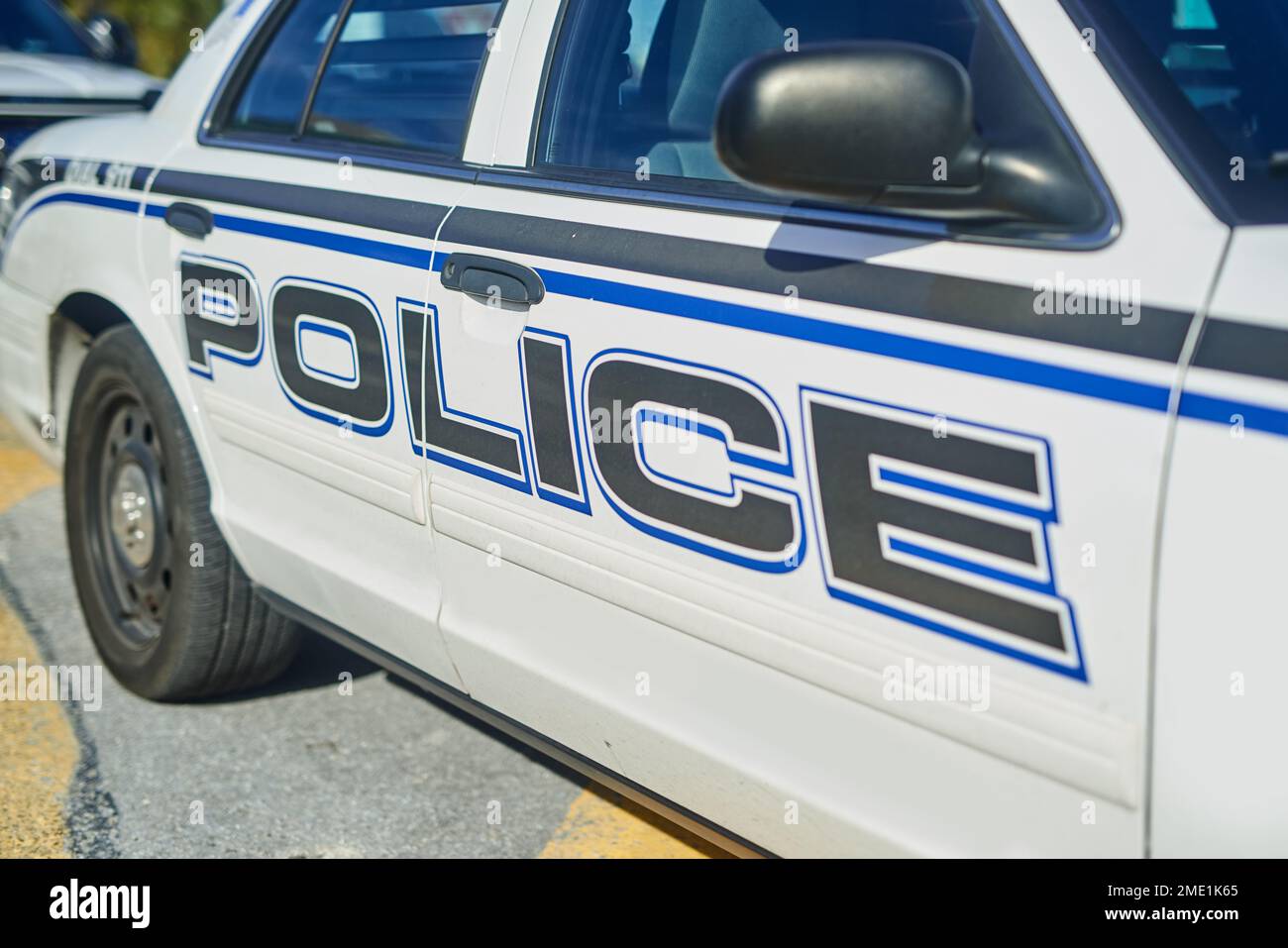Police presence is vital for safety. the side of a police squad car ...