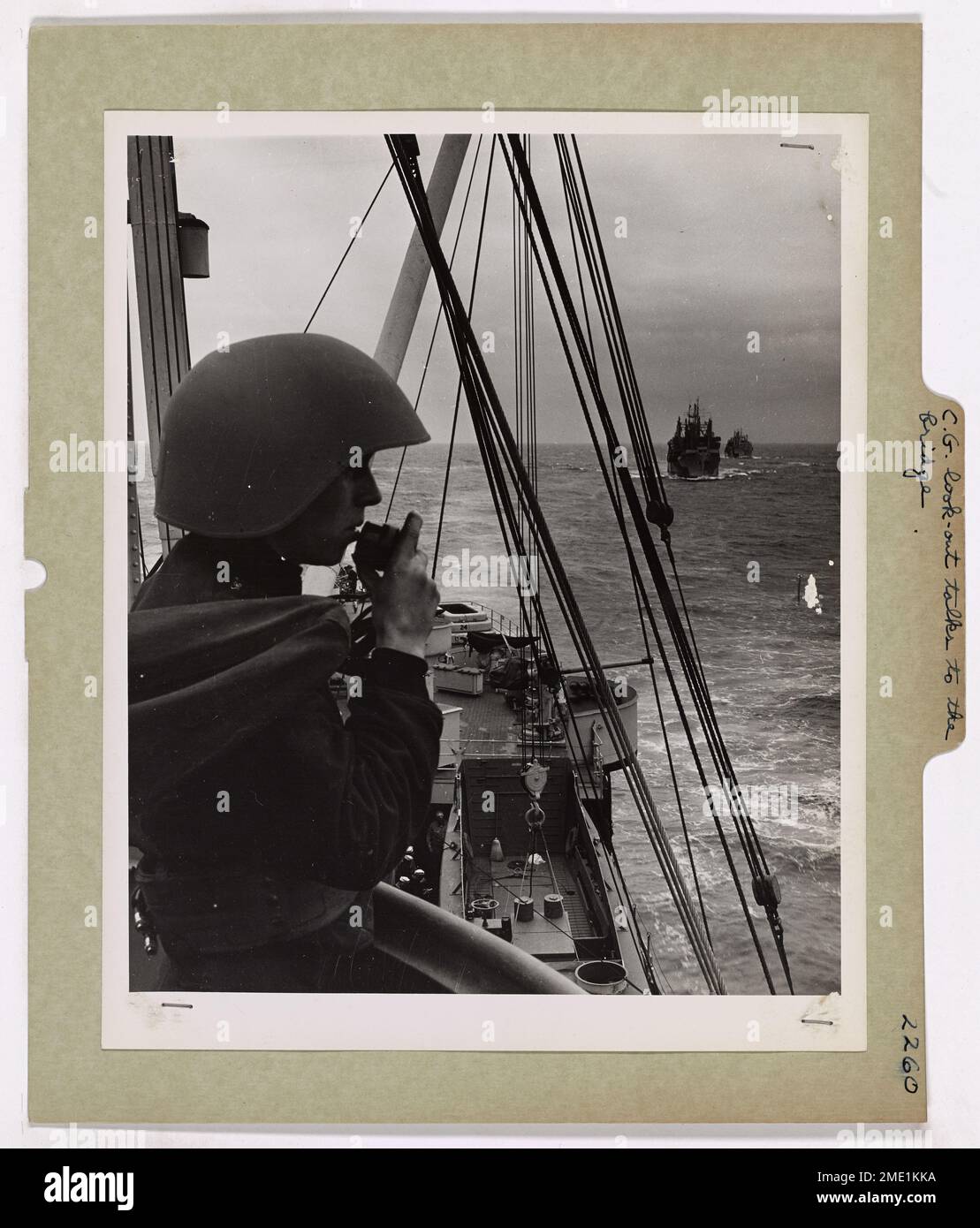 A Coast Guard lookout aboard an assault transport in the Pacific ...