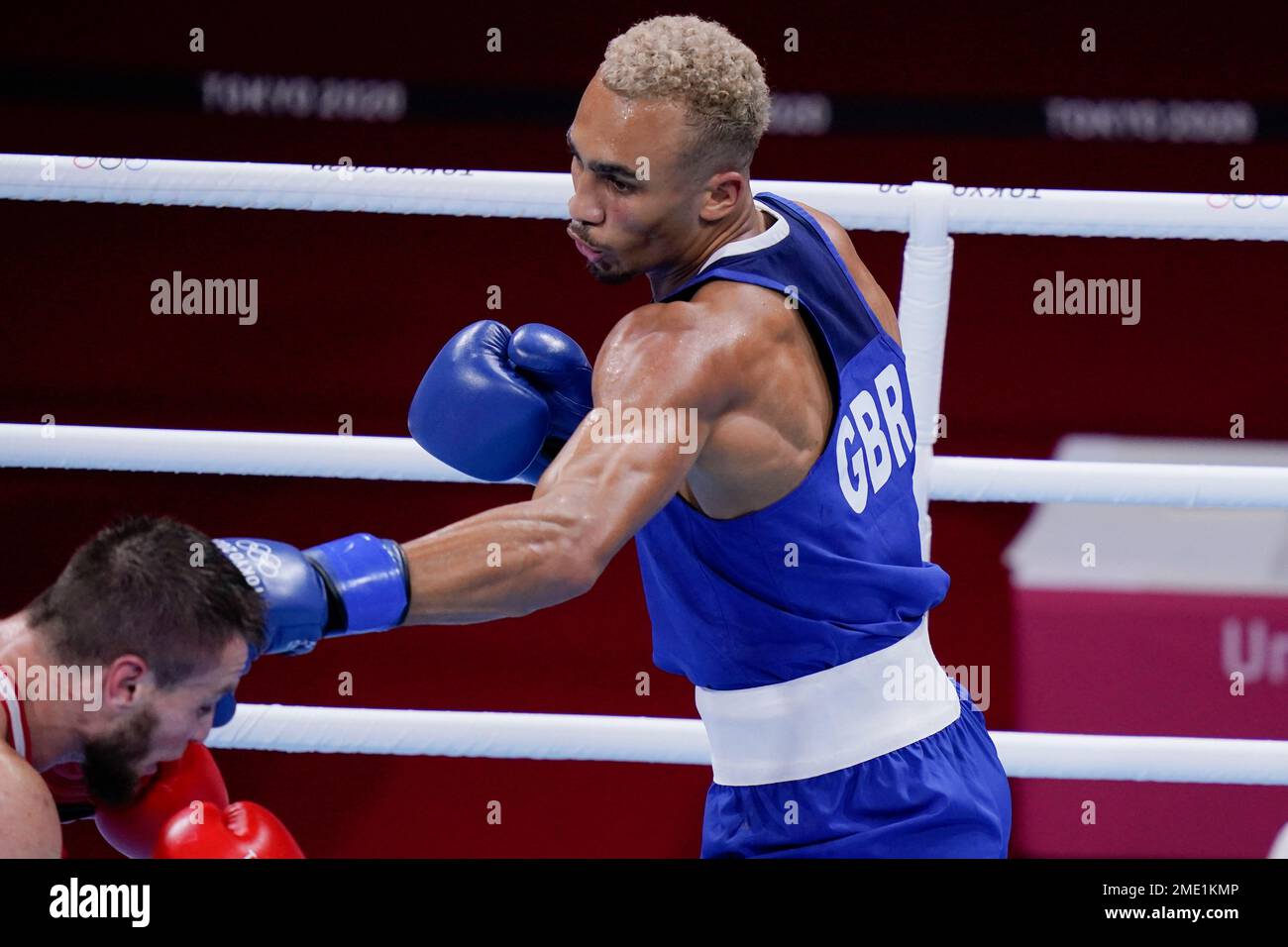 Britain's Benjamin Whittaker, right, punches Russian Olympic Committee ...