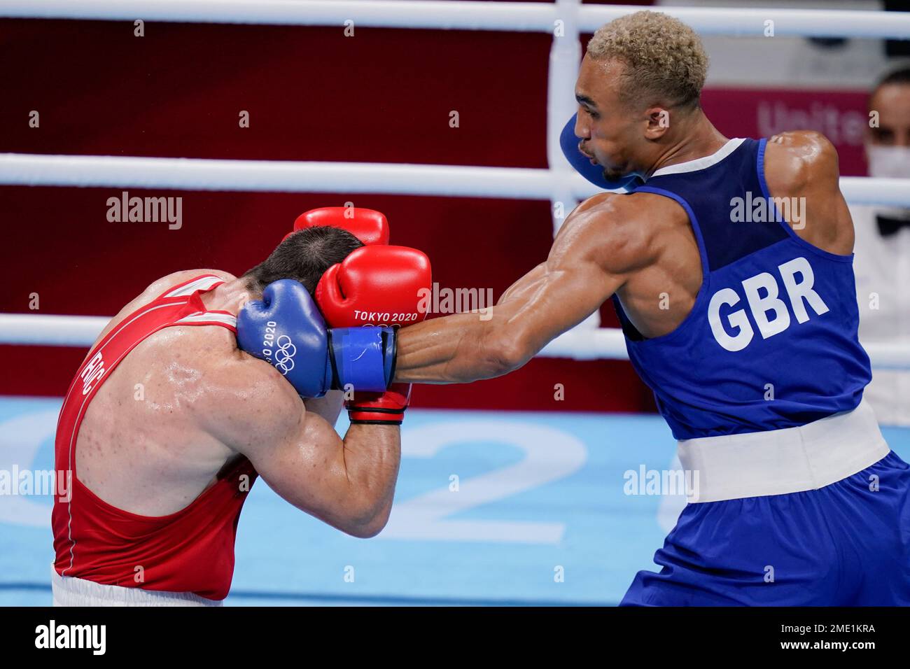 Britain's Benjamin Whittaker, right, punches Russian Olympic Committee ...