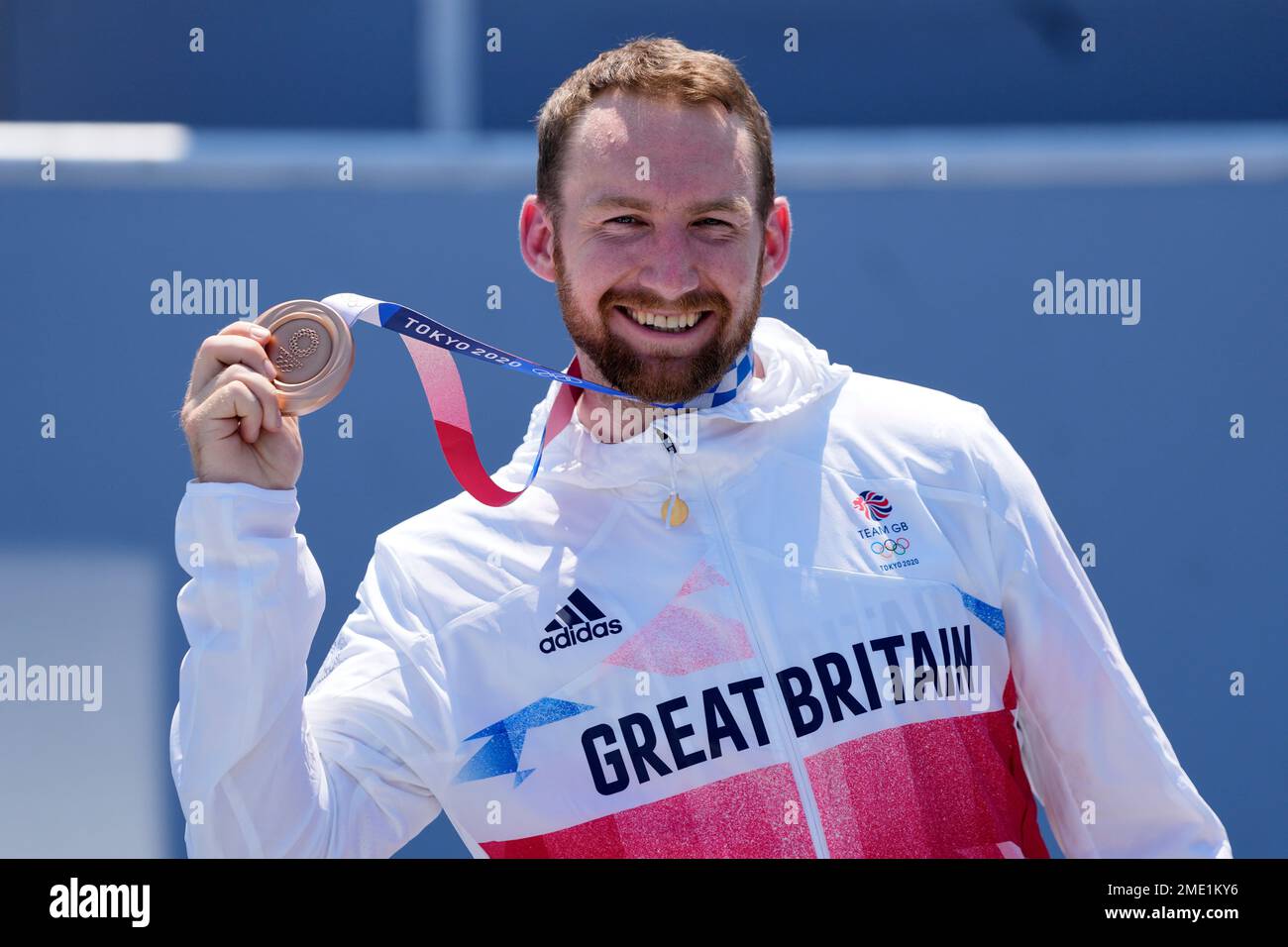 Declan Brooks of Britain poses with the bronze medal in the men's BMX freestyle final at the ...