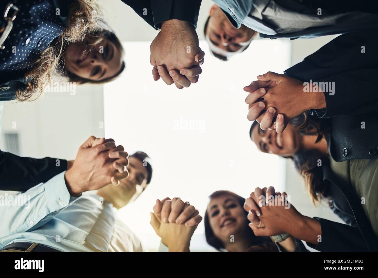 The strong team lies in its circle of support. a group of ...