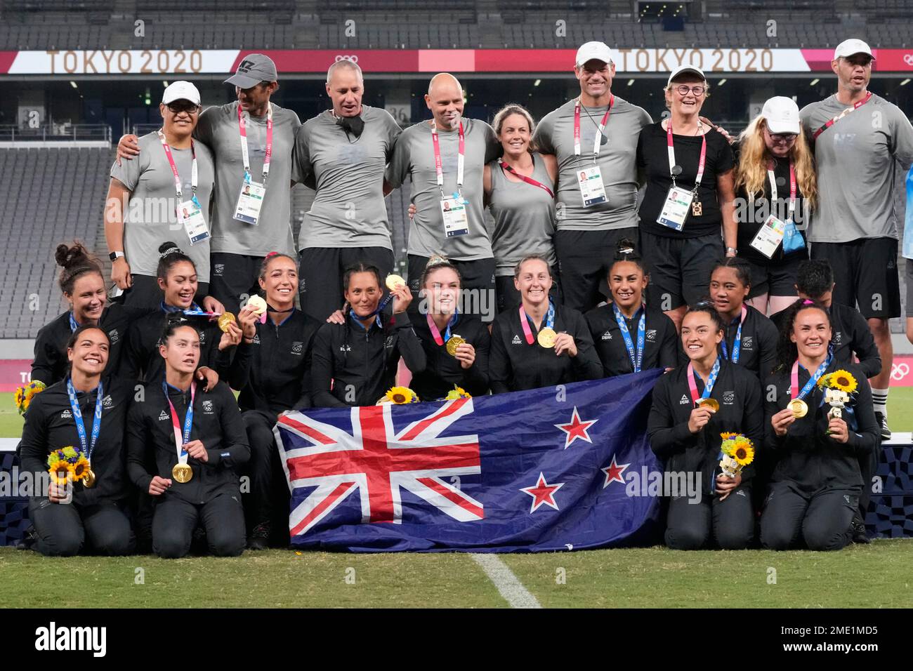 New Zealands Players And Team Staff Pose For A Group Photo After