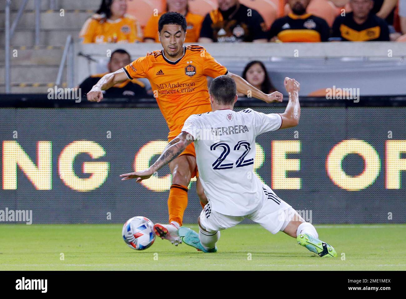 Real Salt Lake defender Aaron Herrera (22) attempts a slide tackle as ...