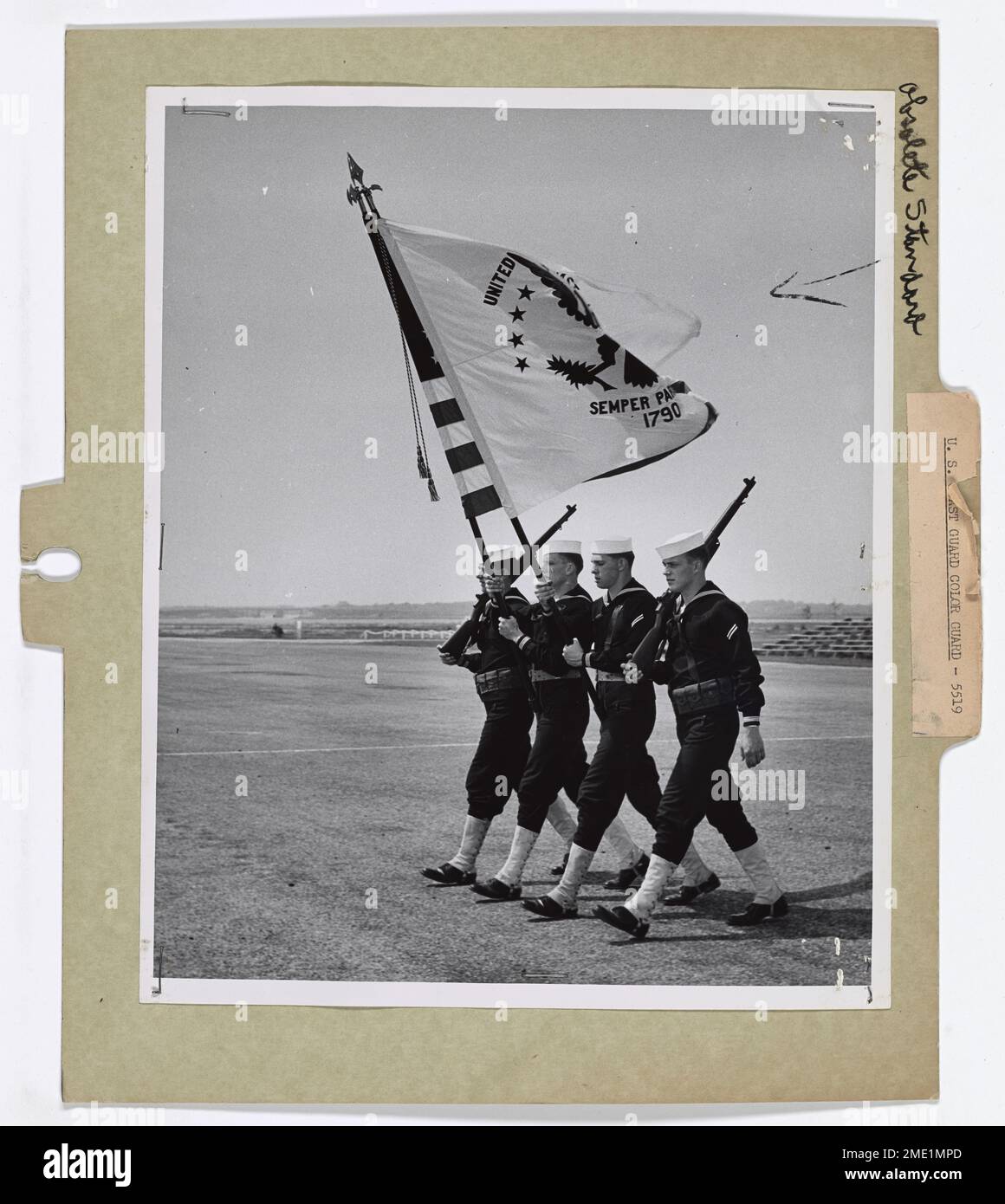 The U.S. Coast Guard Color Guard stands in formation, representing the ...