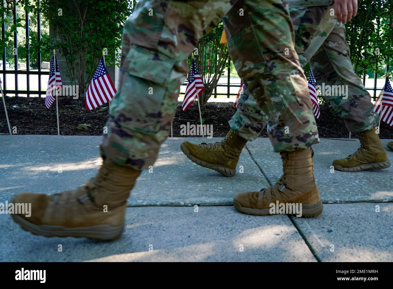 Members of the US military head toward the practice field for the "Back ...