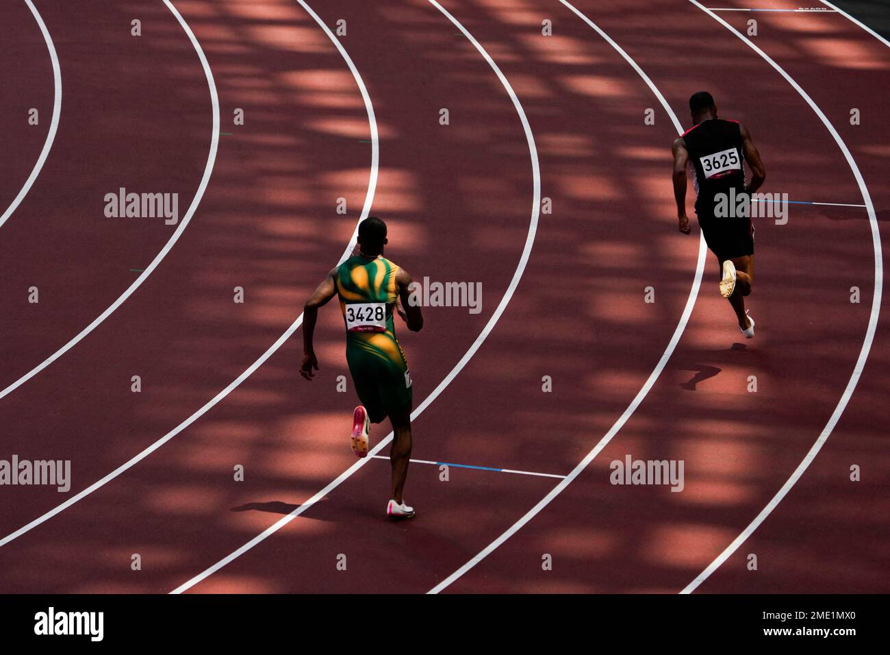Runners compete in a heat in the men's 400-meter run at the 2020 Summer ...
