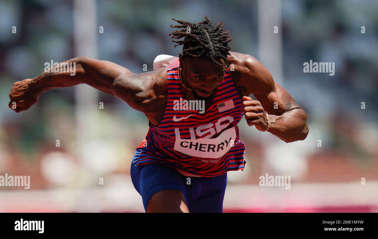 Michael Cherry, of United States, competes in a heat in the men's 400 ...