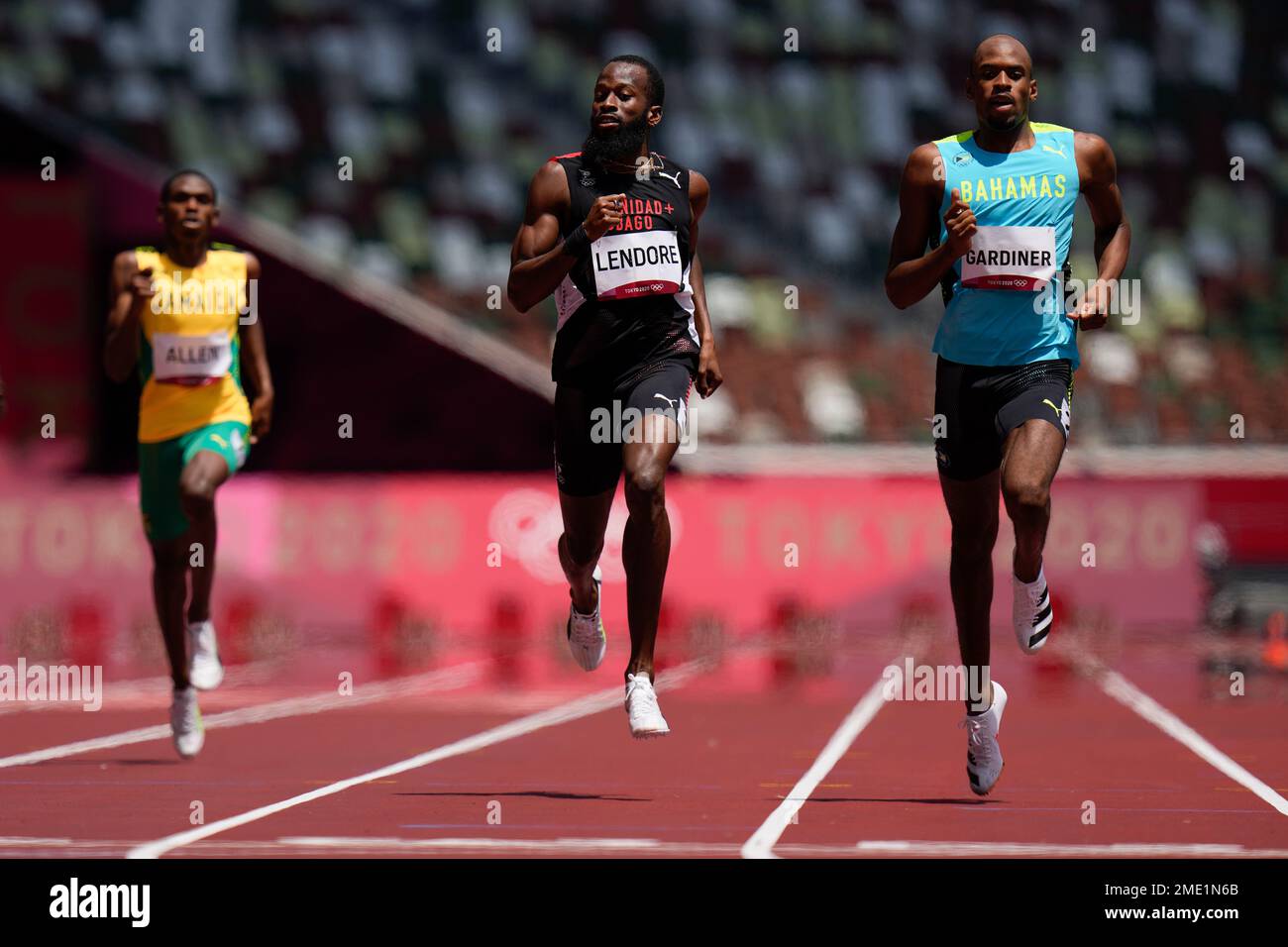 Steven Gardiner, of Bahamas, runs in a heat in the men's 400-meter run ...