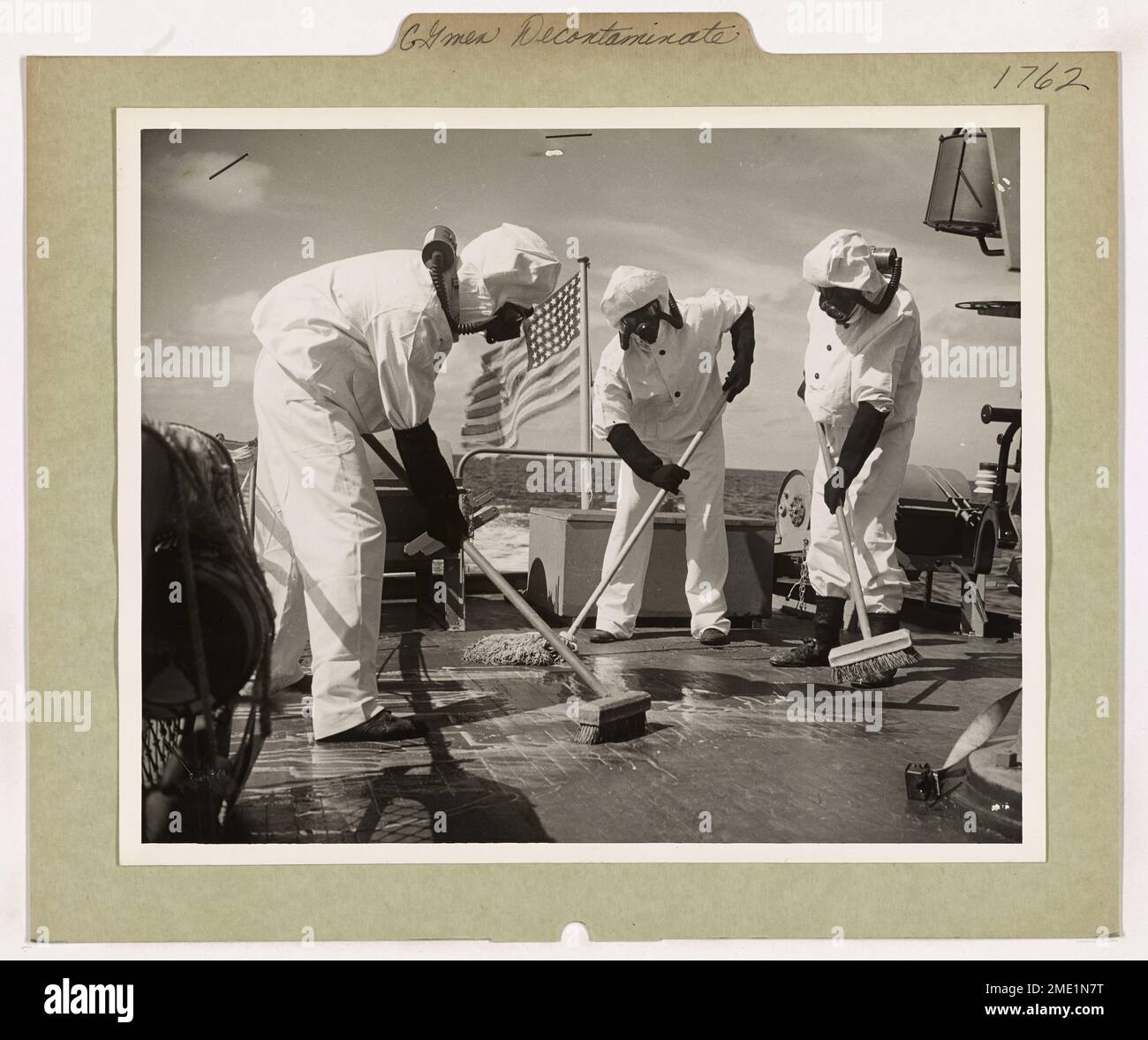 Coast Guard decontamination teams scrub down decks of vessels after ...