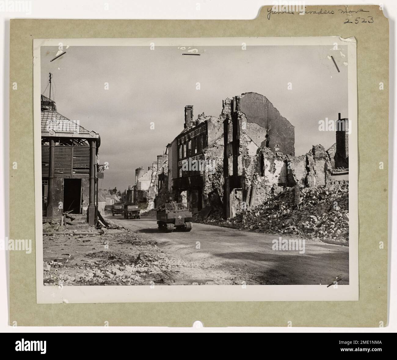 Photograph of First Armored Units Passing Through the Ruins of Shell ...